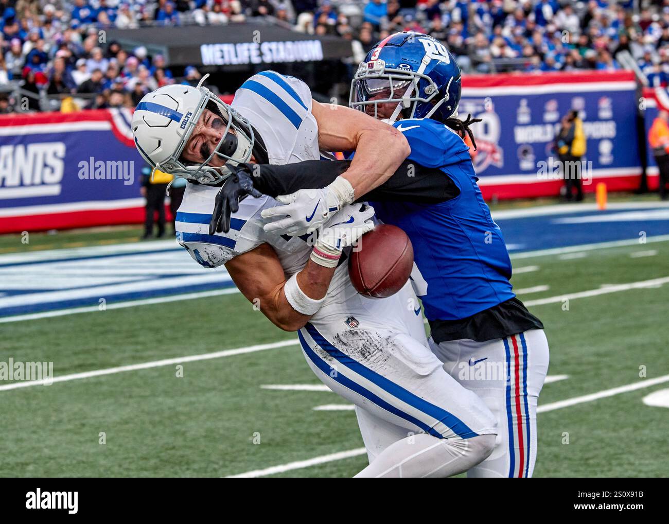 New York Giants cornerback Deonte Banks (3) breaks up a pass intended for Indianapolis Colts ...