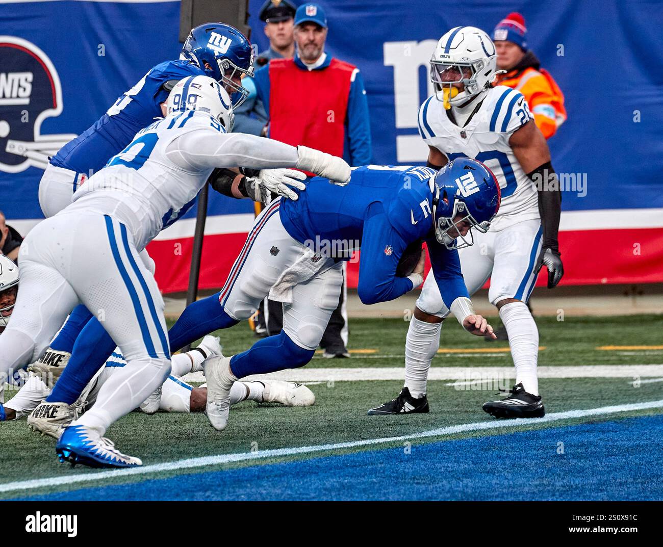 New York Giants quarterback Drew Lock (2) scores a touchdown against ...