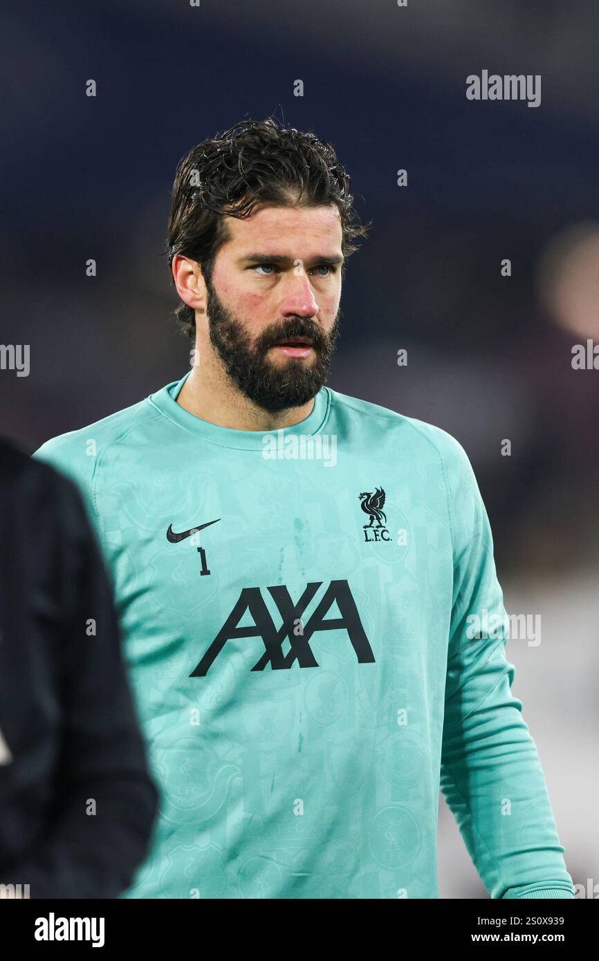 Allison of Liverpool warms up during the Premier League match between ...