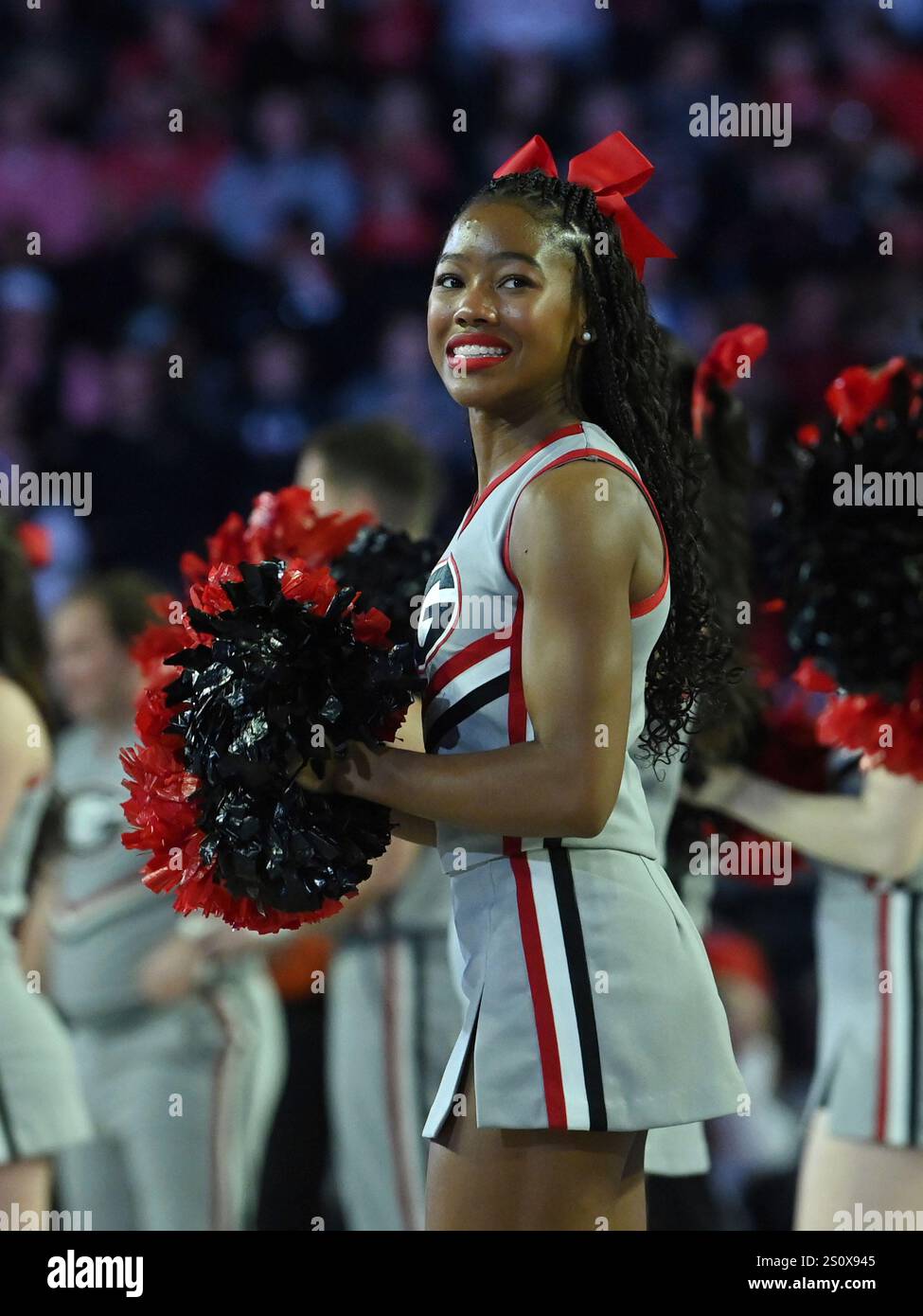 ATHENS, GA - DECEMBER 29: A Georgia Bulldogs cheerleader performs ...