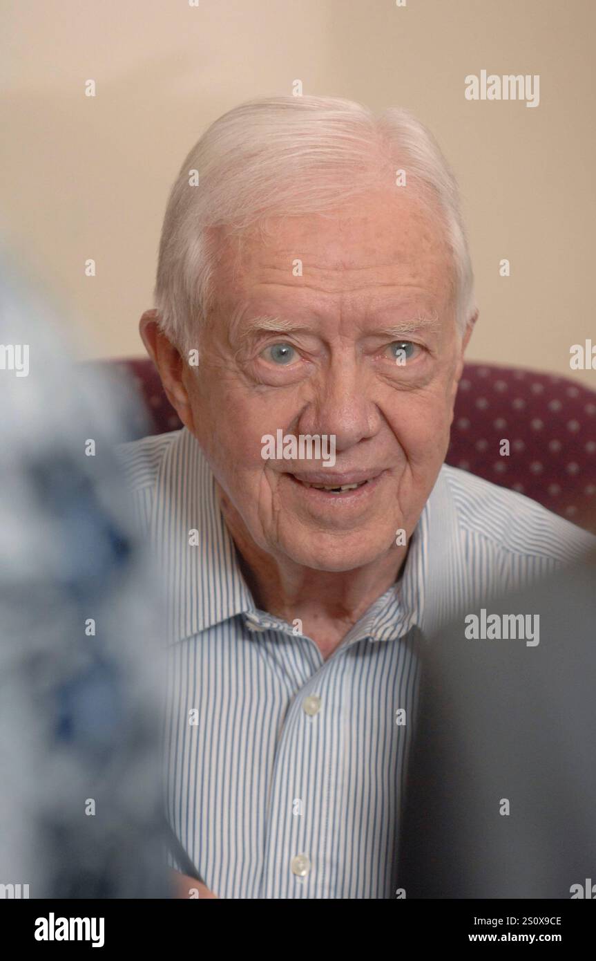 Austin, TX December 14, 2006: Former U.S. President Jimmy Carter signs ...