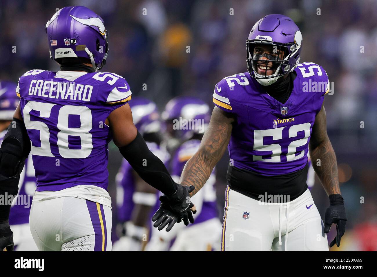 Minnesota Vikings linebackers Jihad Ward (52) and Jonathan Greenard (58 ...