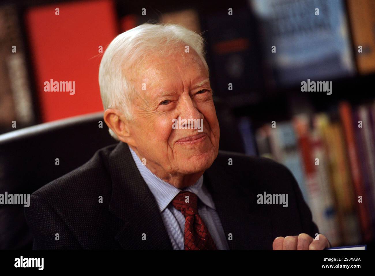 Former US President Jimmy Carter signs copies of his new book 'A Call ...