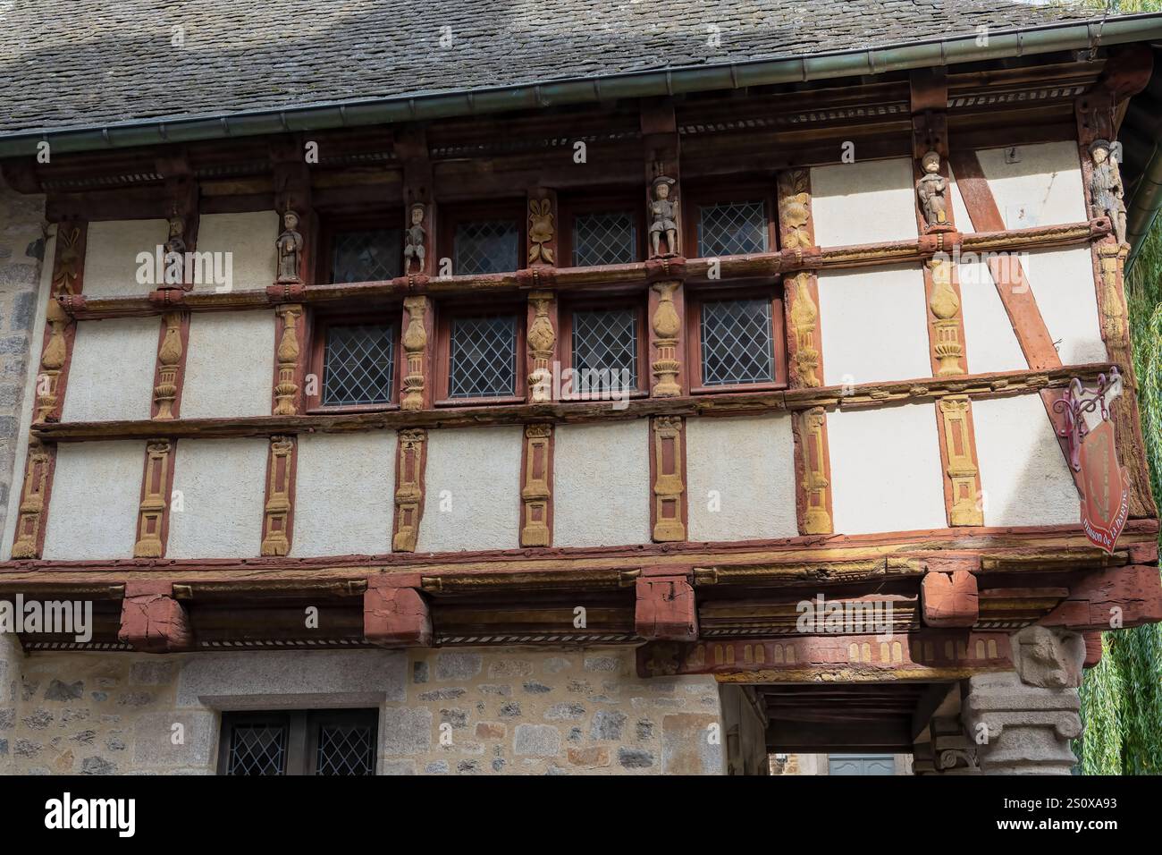 view between old stone walls and buildings of a beautifully preserved ...