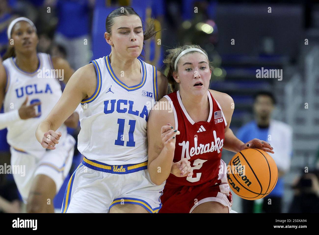 Nebraska guard Allison Weidner, right, drives against UCLA guard ...