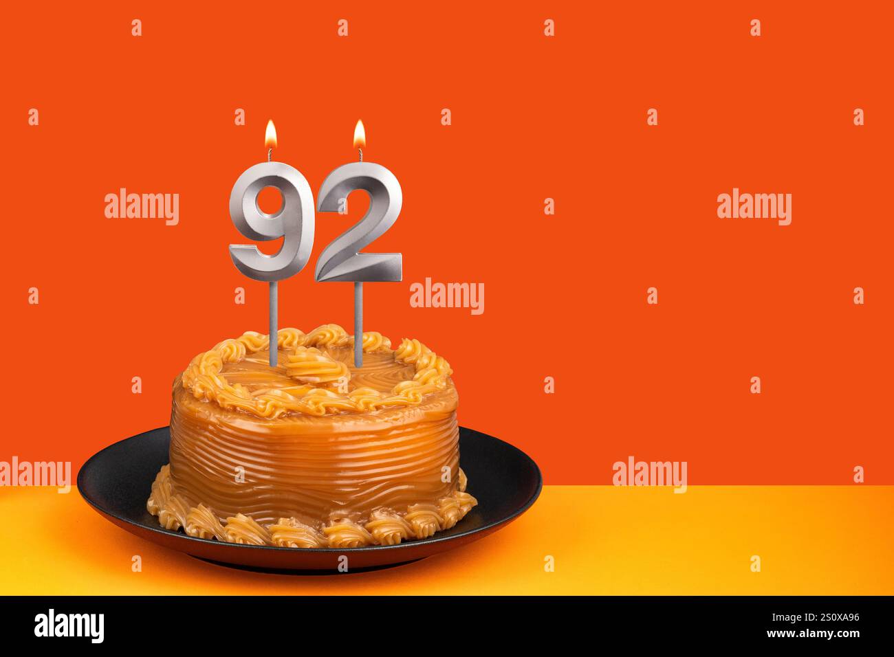 Birthday cake with dulce de leche frosting - Candle number 92 Stock ...