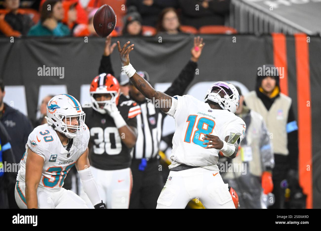 Miami Dolphins quarterback Tyler Huntley (18) reacts after scoring a ...