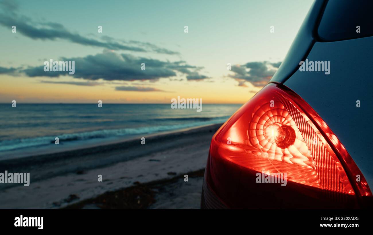 turning on the car's red brake lights Stock Photo - Alamy