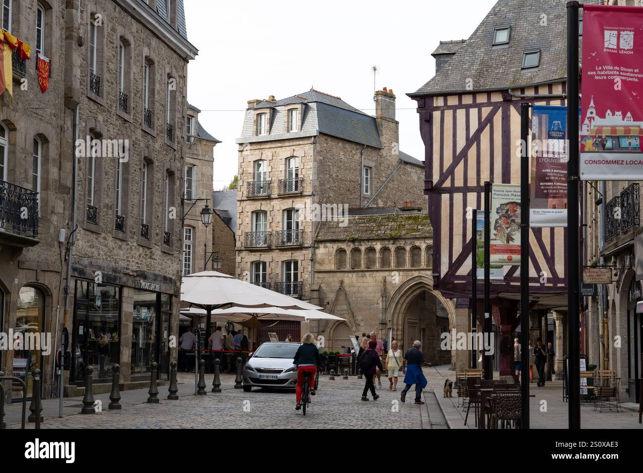view between old stone walls and buildings of a beautifully preserved ...