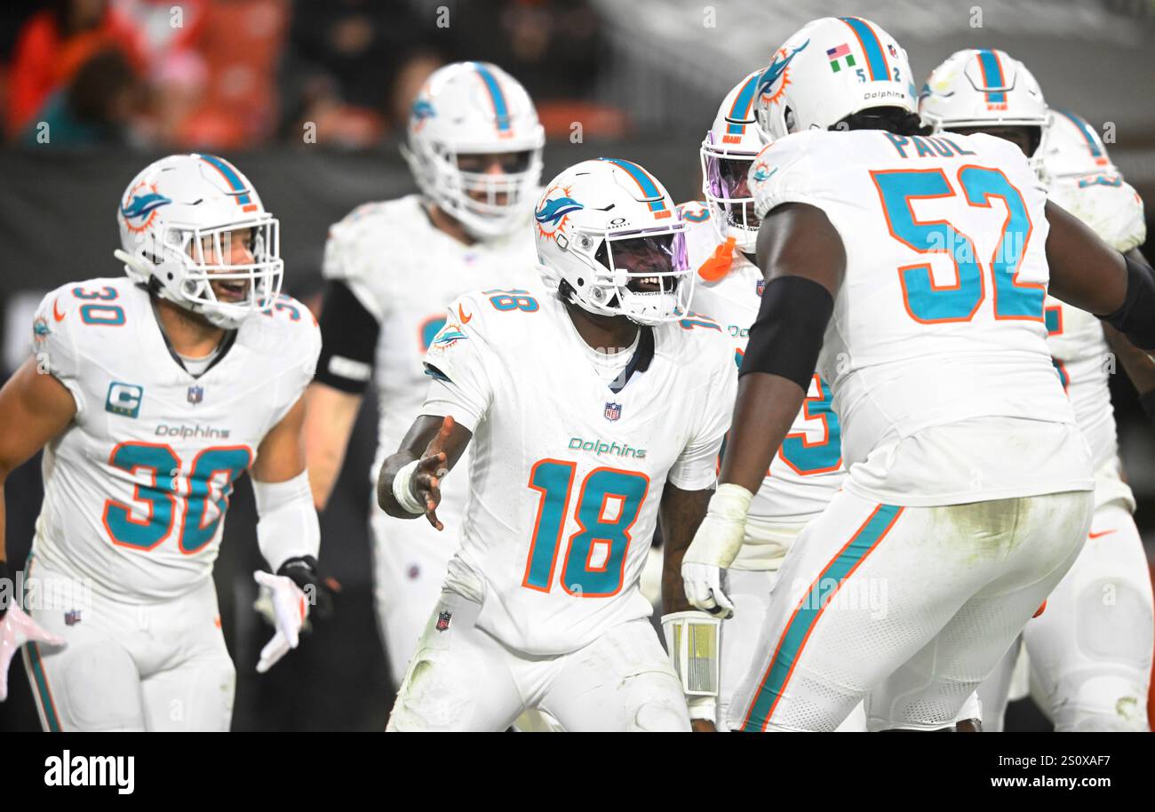 Miami Dolphins quarterback Tyler Huntley (18) celebrates after scoring ...