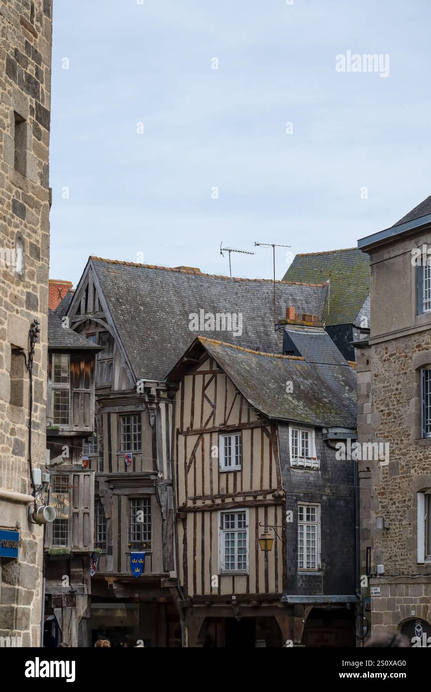 view between old stone walls and buildings of a beautifully preserved ...