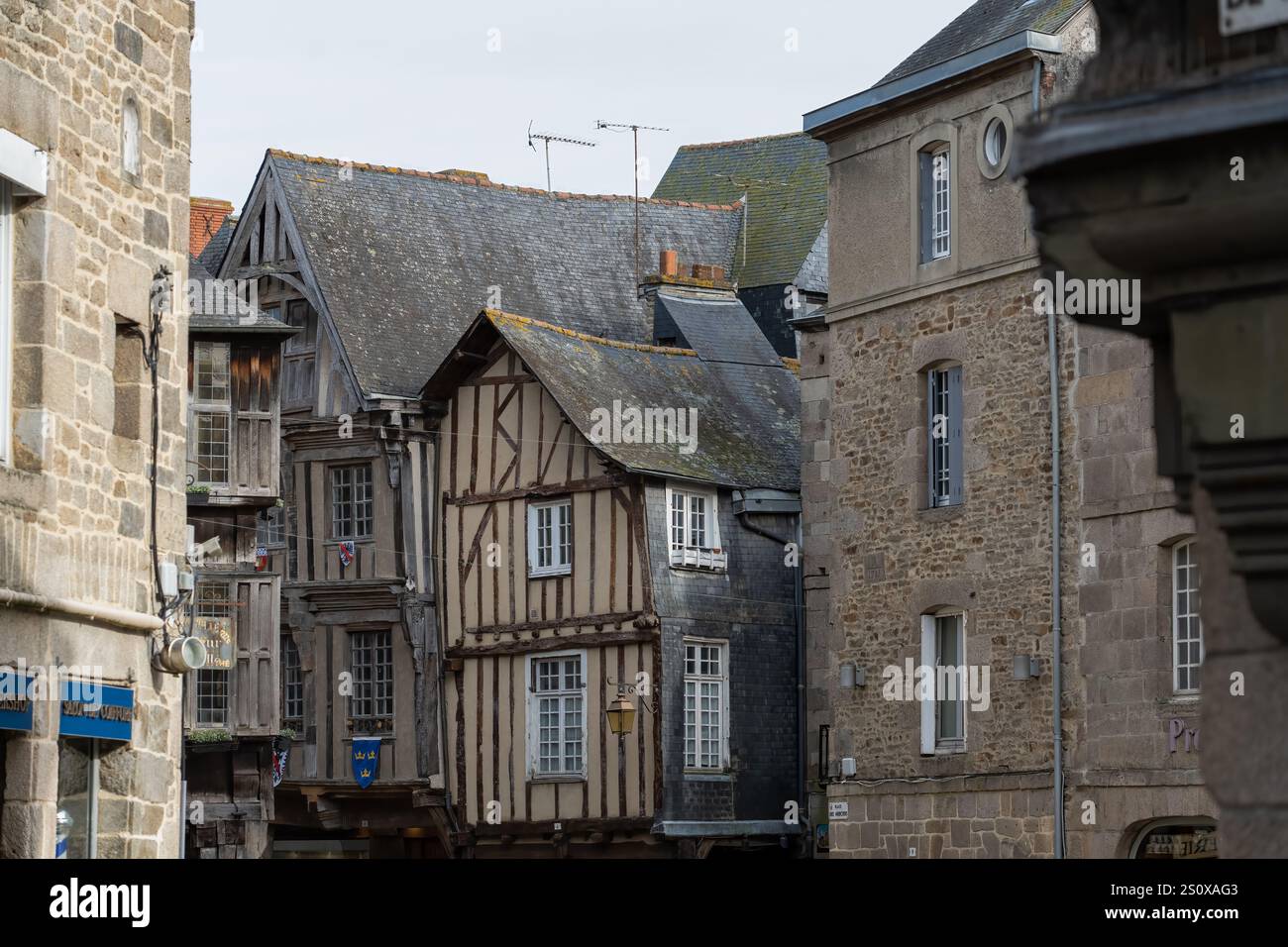 view between old stone walls and buildings of a beautifully preserved ...