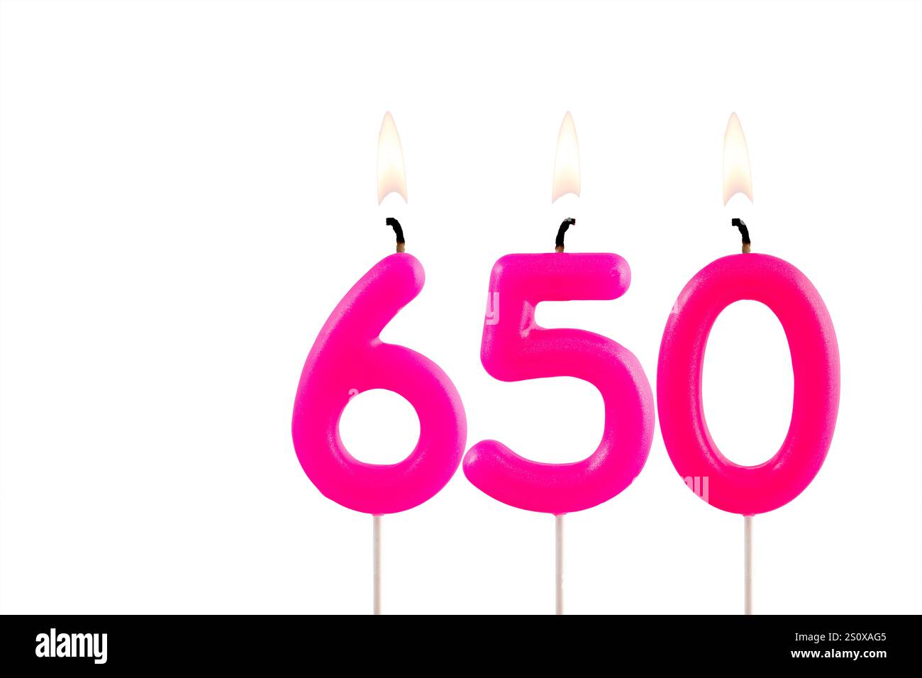 Candles forming the number 650 - white background Stock Photo - Alamy