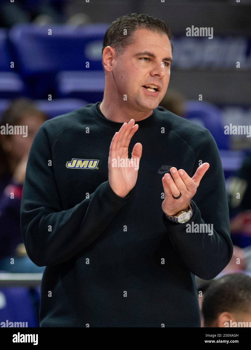 James Madison head coach Preston Spradlin cheers his team during the ...