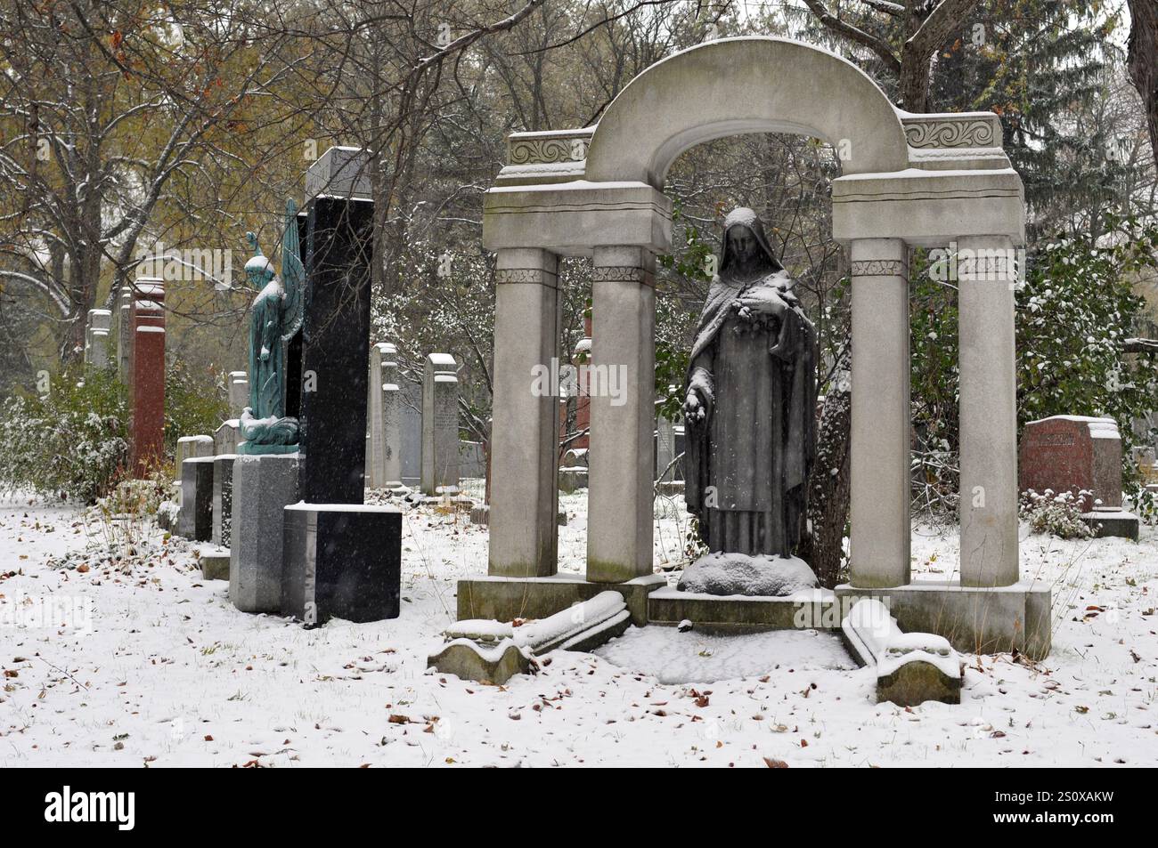 Fresh snow covers monuments and graves at Montreal's historic Notre ...