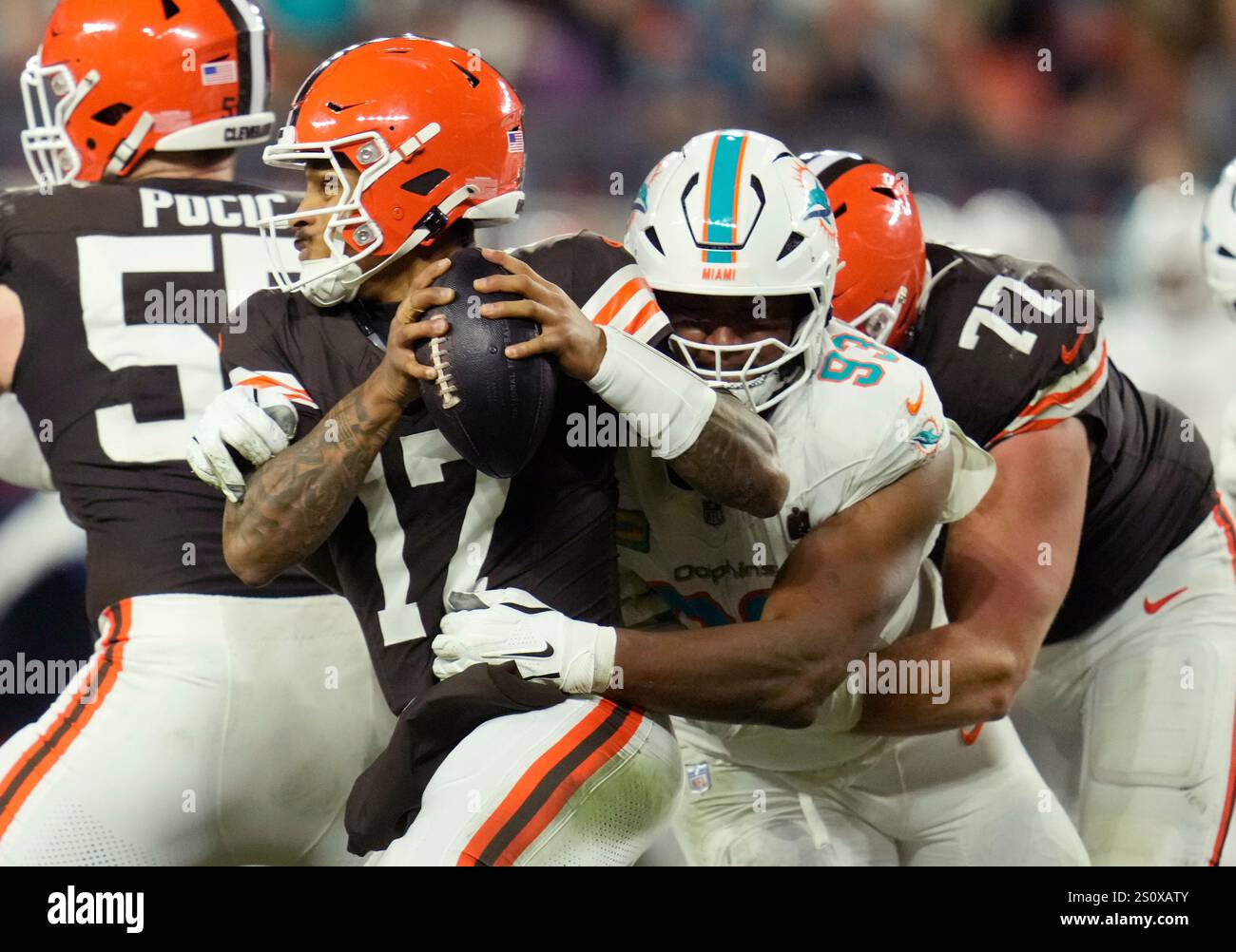 Cleveland Browns quarterback Dorian Thompson-Robinson (17) is pressured ...