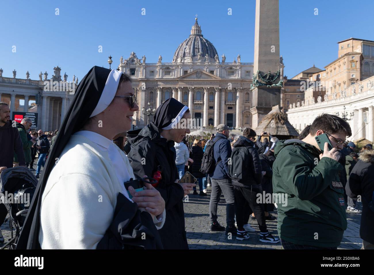Rome, Italy. 29th Dec, 2024. Nuns in St. Peter's Square in Rome before ...