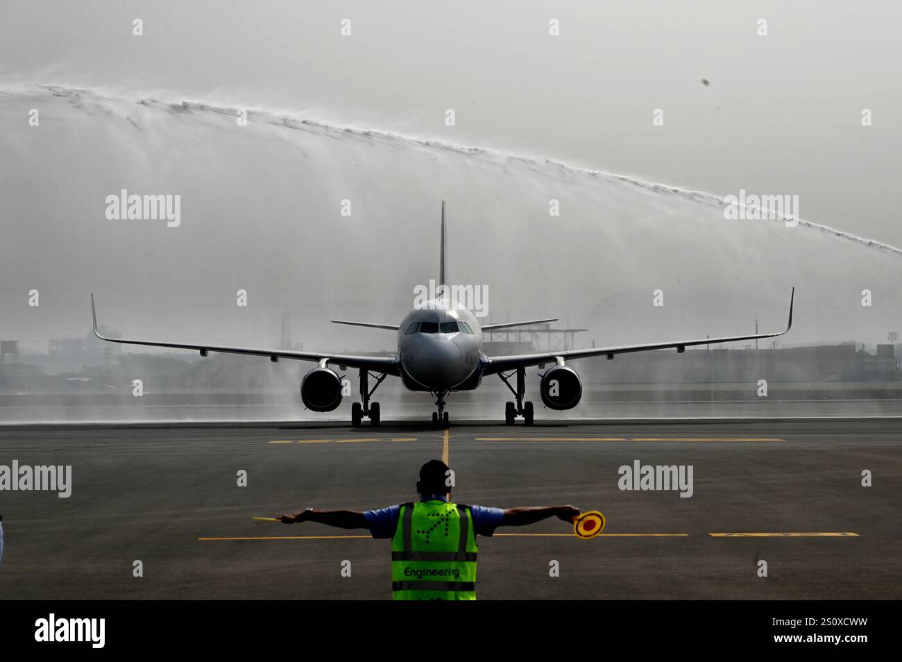 NAVI MUMBAI, INDIA - DECEMBER 29: First commercial aircraft landing on ...