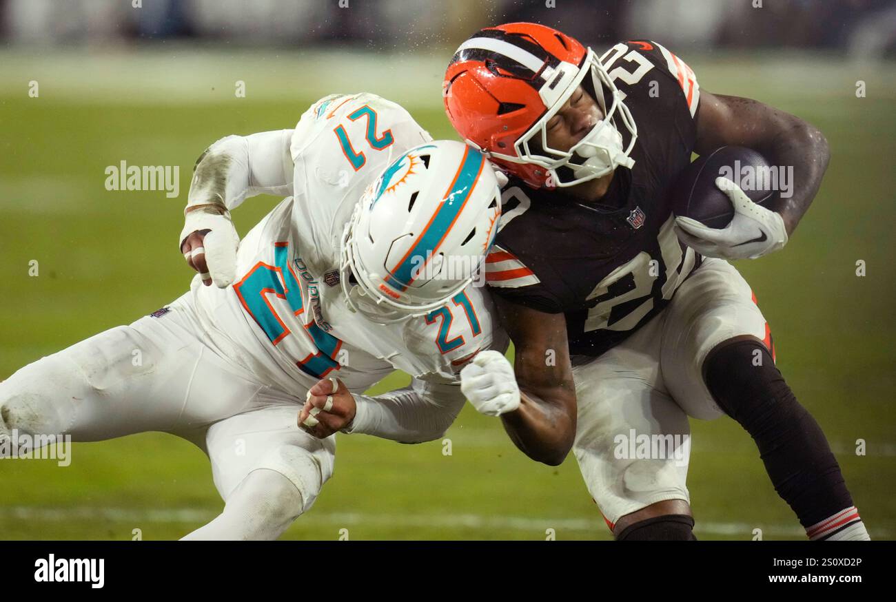 Cleveland Browns running back Pierre Strong Jr. (20) is tackled by ...