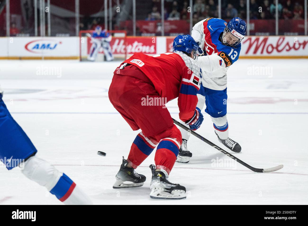 Tobias Tomik of, Slovakia. , . during the 2025 IIHF World Junior ...
