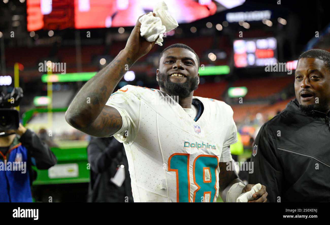 Miami Dolphins quarterback Tyler Huntley (18) runs off the field after ...