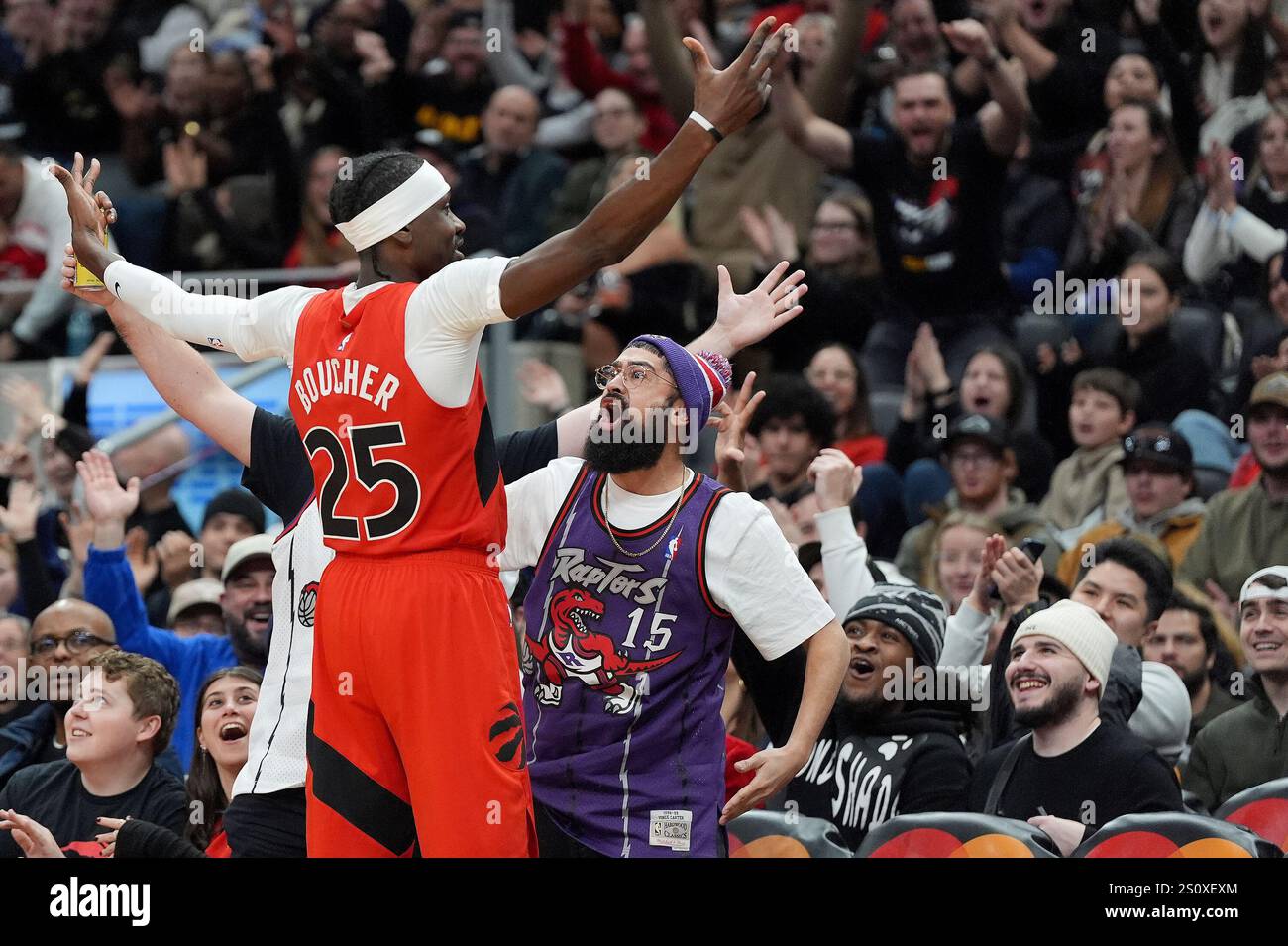 Toronto Raptors forward Chris Boucher (25) celebrates with fans after ...