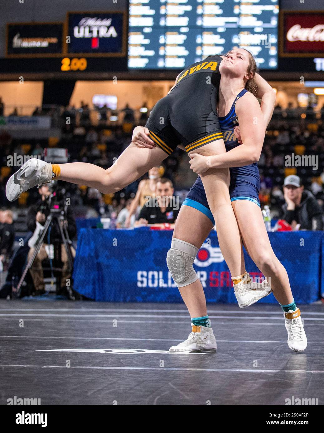 Team Nazar Training Center's Madilyn Peach wrestles Iowa's Emily Frost ...