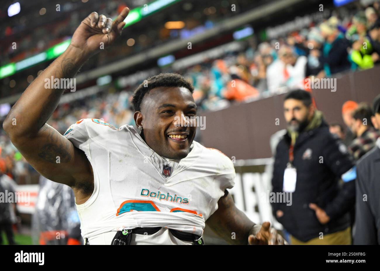 Miami Dolphins running back Jeff Wilson Jr. runs off the field after the Dolphins defeated the ...