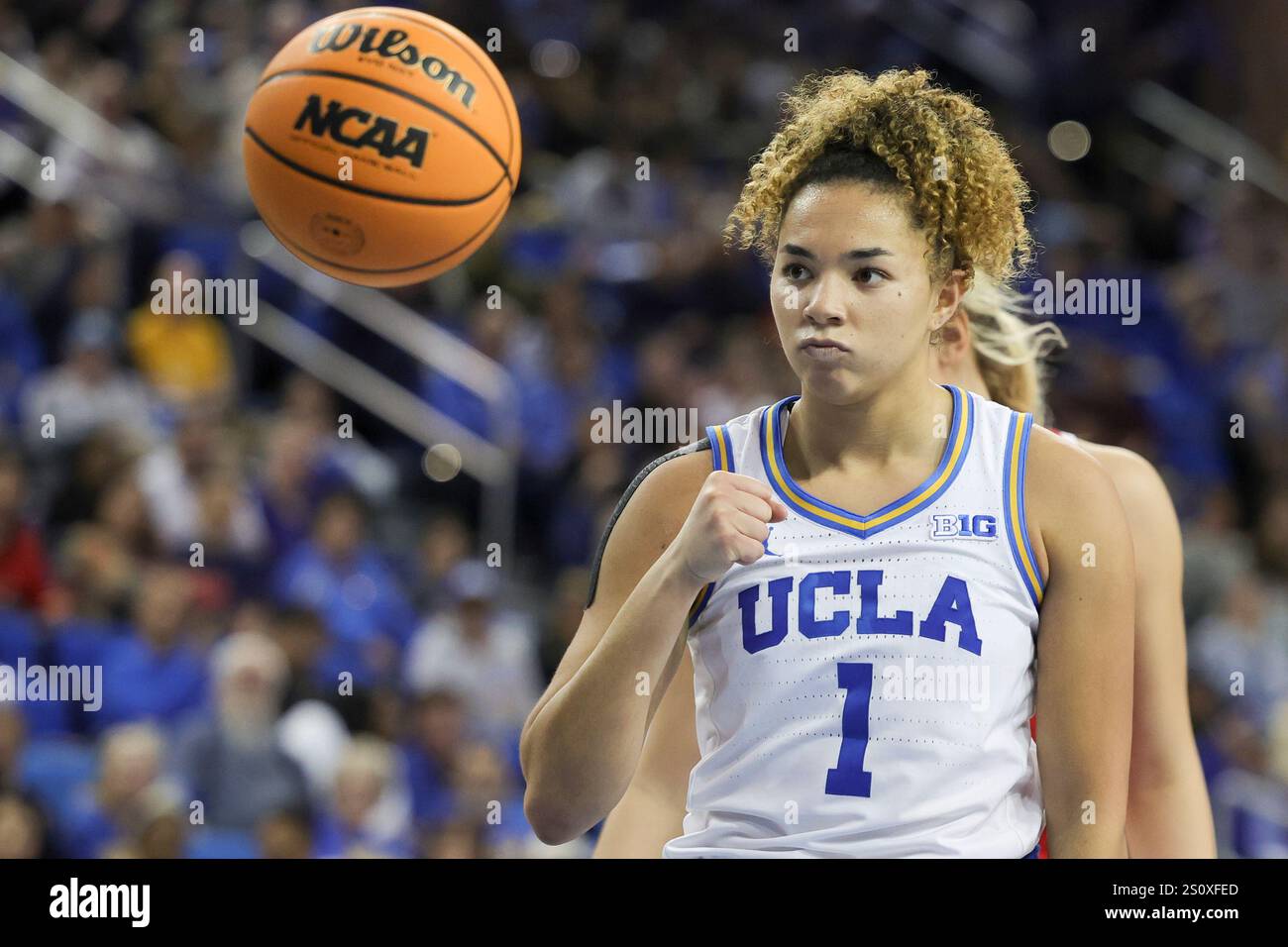 UCLA guard Kiki Rice celebrates after an and-one foul during the second ...
