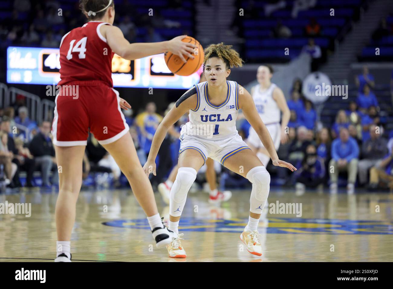 UCLA guard Kiki Rice, right, guards Nebraska guard Callin Hake during ...