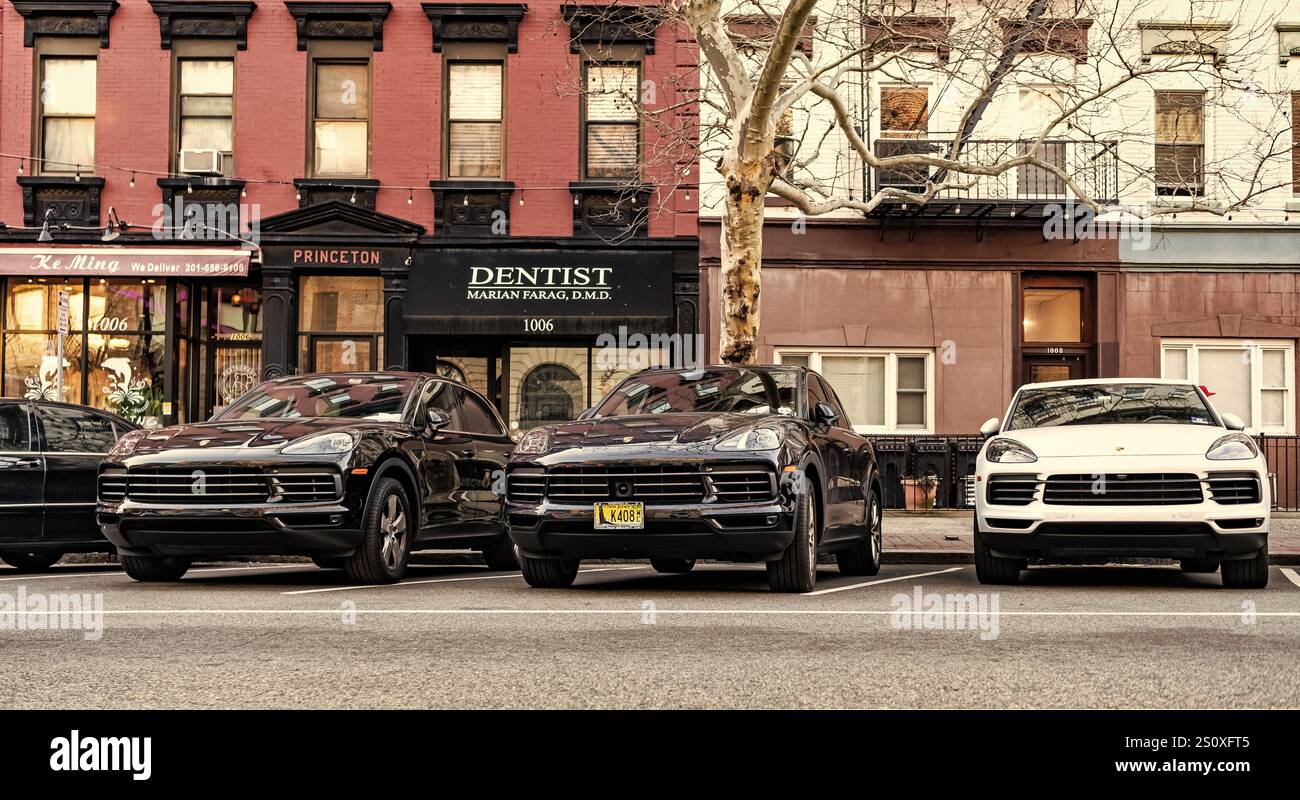 New York City, USA - March 15, 2024: Porsche Cayenne two cars parked in ...
