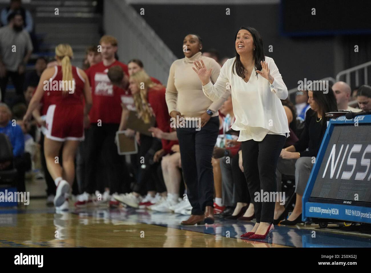 Nebraska Cornhuskers head coach Amy Williams reacts in the first half ...