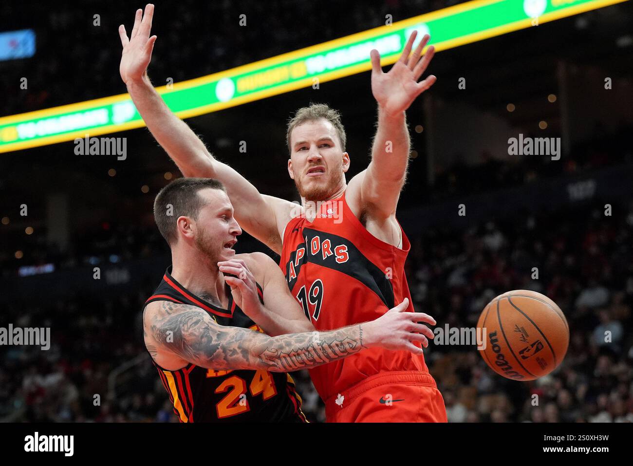 Atlanta Hawks guard Garrison Mathews (24) passes the ball while under ...