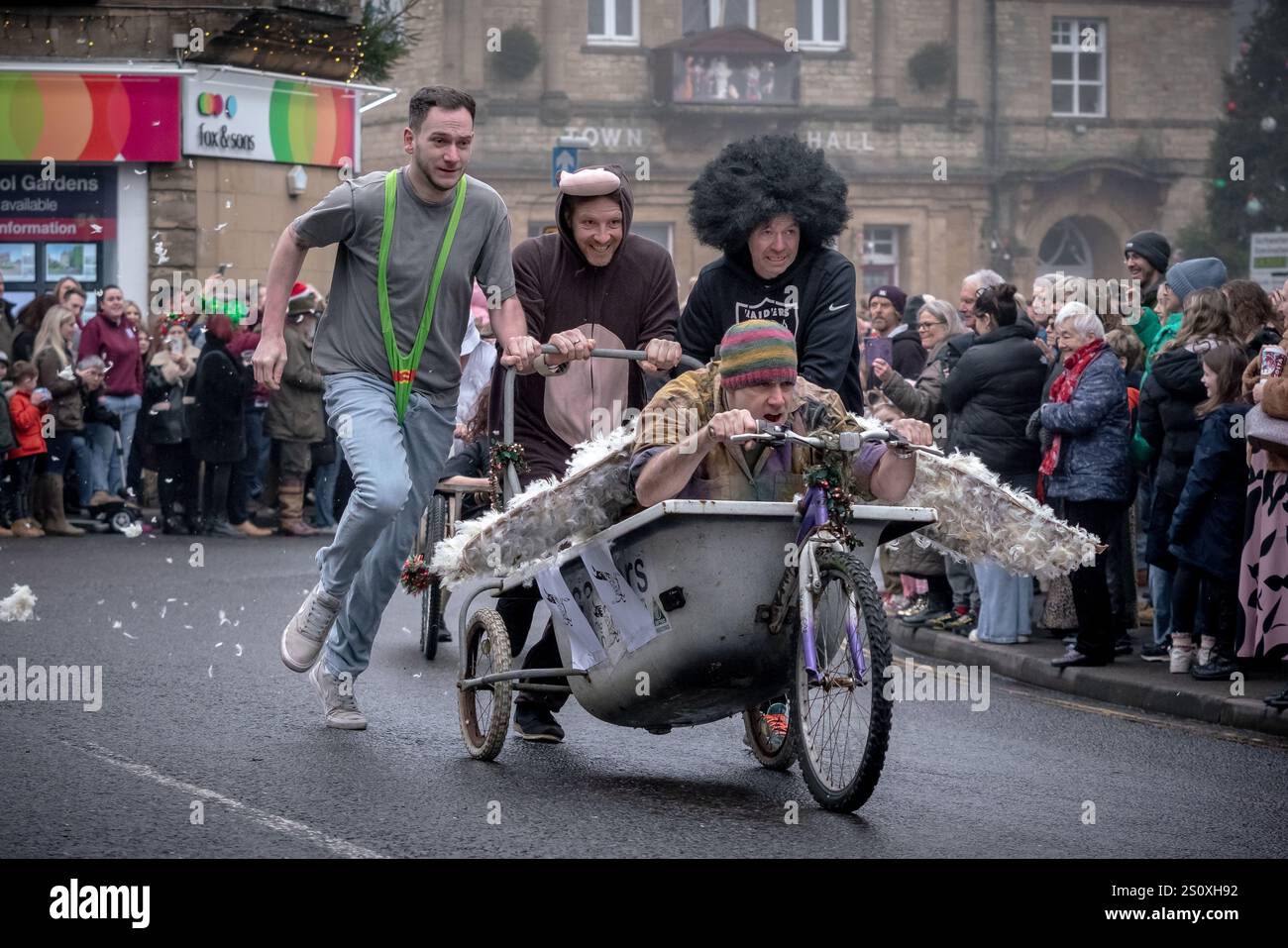 Boxing Day Pram Race in Crewkerne. Hundreds of locals line the streets ...