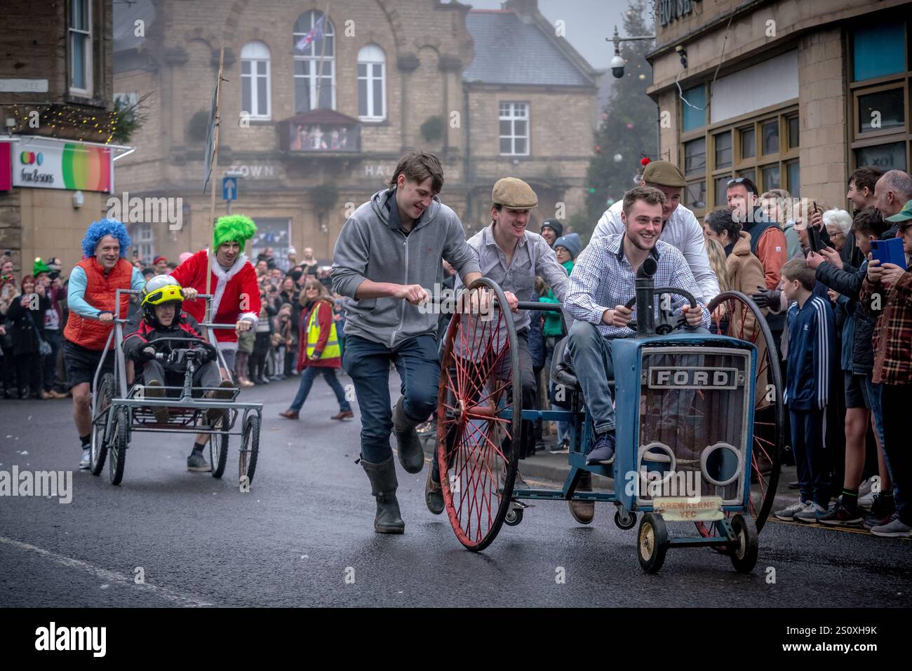 Boxing Day Pram Race in Crewkerne. Hundreds of locals line the streets ...
