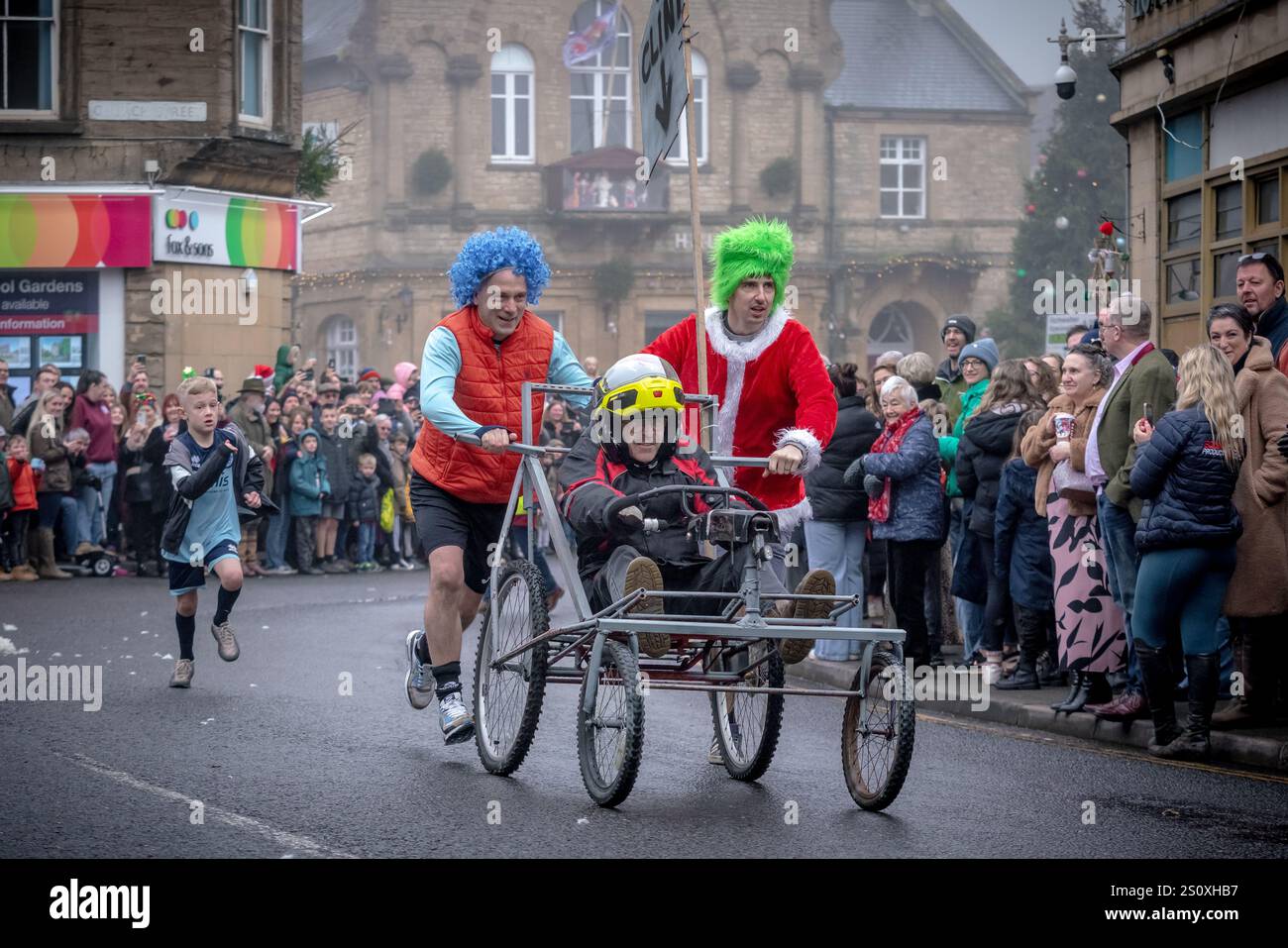 Boxing Day Pram Race in Crewkerne. Hundreds of locals line the streets ...