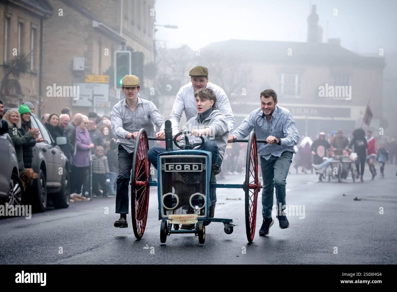 Boxing Day Pram Race in Crewkerne. Hundreds of locals line the streets ...