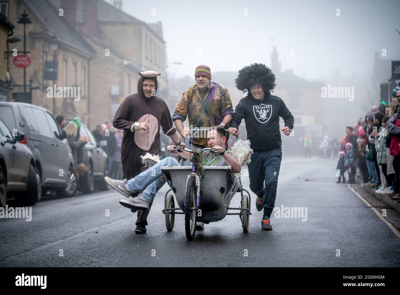 Boxing Day Pram Race in Crewkerne. Hundreds of locals line the streets ...