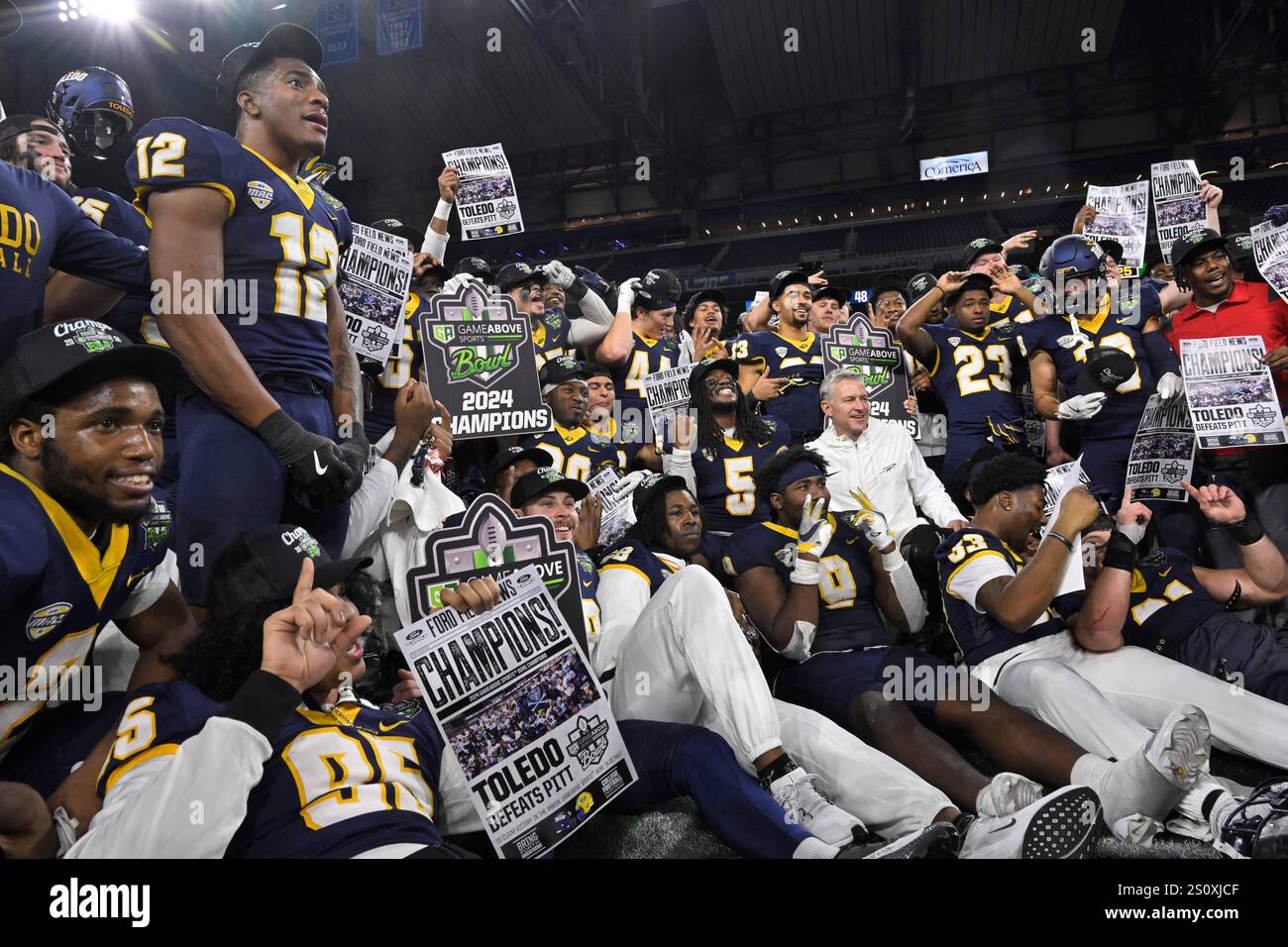 DETROIT, MI - DECEMBER 26: Toledo Rockets football team gathers on the ...