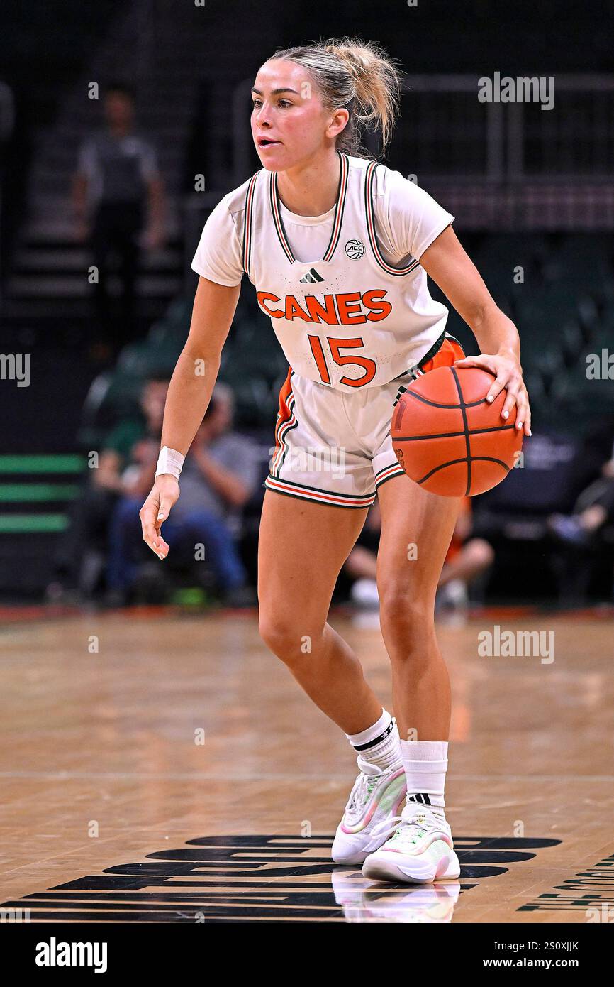CORAL GABLES, FL - DECEMBER 29: Miami guard Hanna Cavinder (15) handles ...
