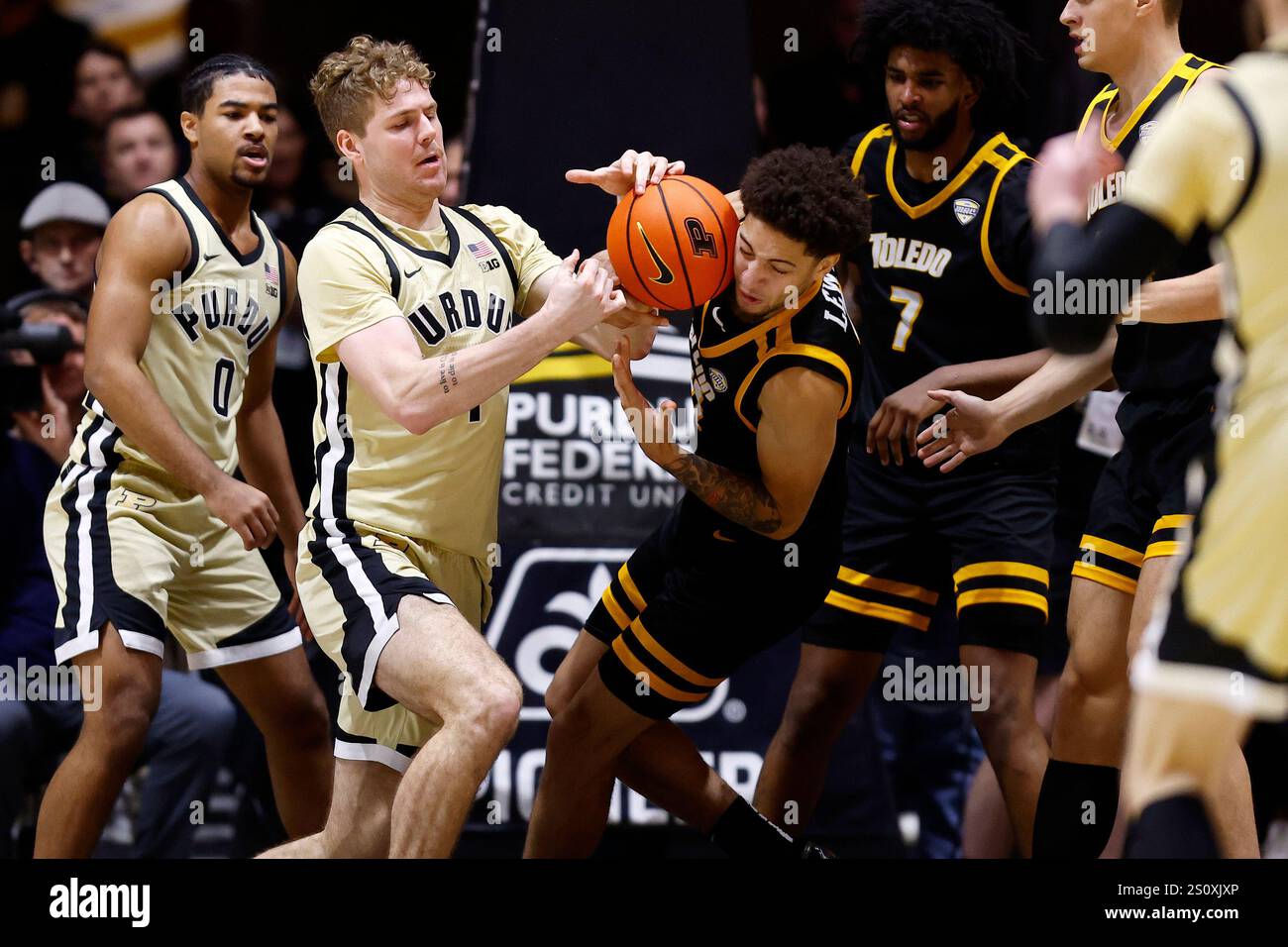 WEST LAFAYETTE, IN - DECEMBER 29: Purdue Boilermakers forward Caleb Furst (1) battles for ...
