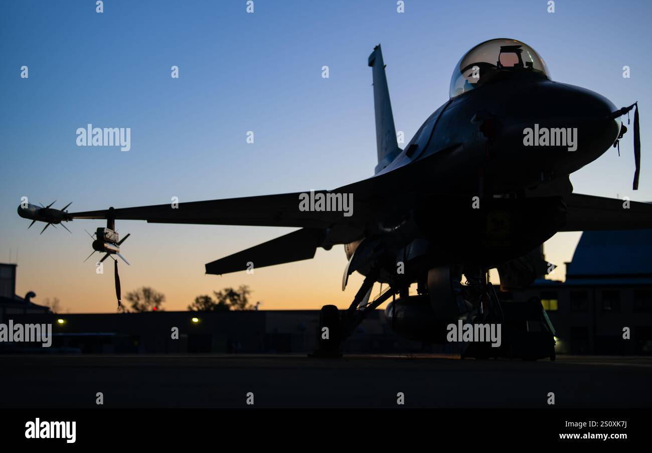 An F-16 Fighting Falcon sits on the flight line at the 122nd Fighter ...