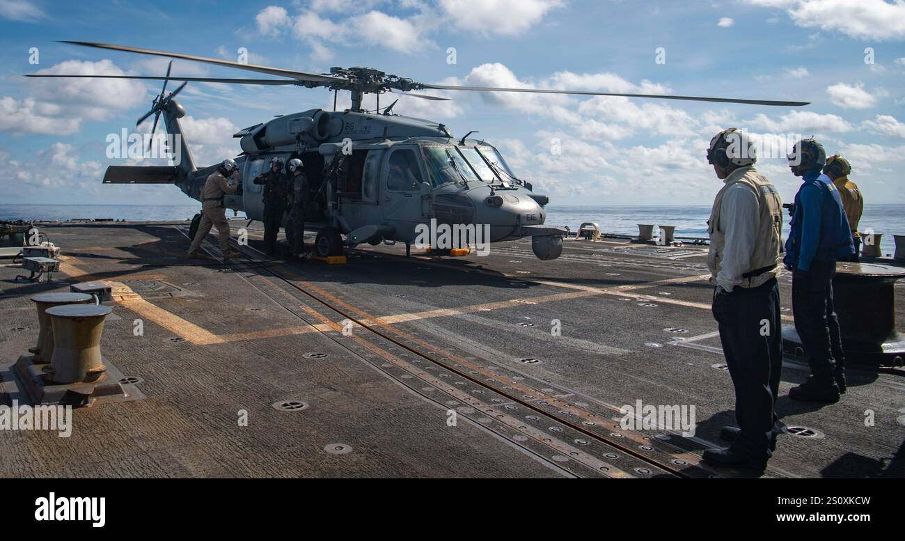 SOUTH CHINA SEA (Dec. 25, 2024) – Rear Adm. Michael Wosje, commander, Carrier Strike Group ONE ...