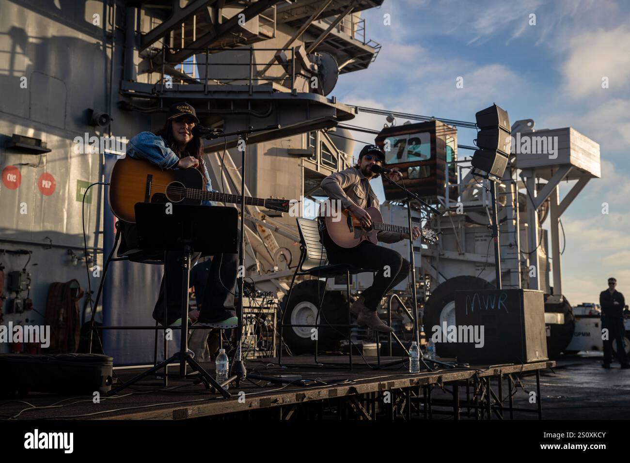 240419-N-CK999-2105 PACIFIC OCEAN (Dec. 19, 2024) Country music singers ...