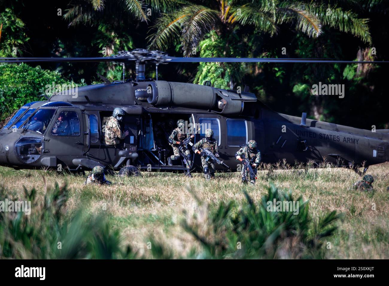 Members of the Malaysian Armed Forces, Australian Defence Force, and the U.S. Army conduct an ...