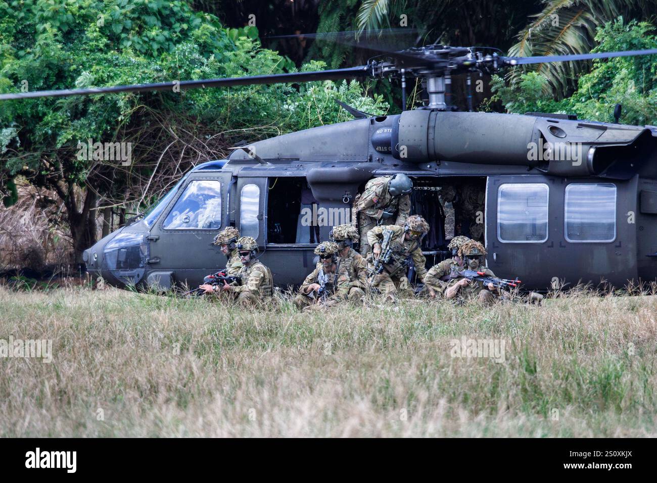 Members of the Malaysian Armed Forces, Australian Defence Force, and the U.S. Army conduct an ...