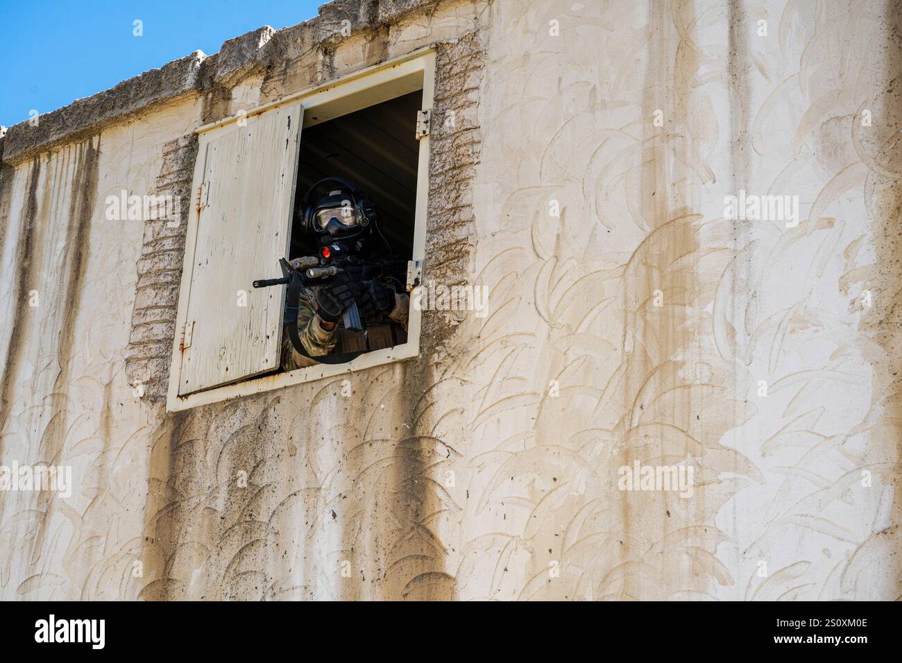 An Airmen with the 821st Contingency Response Squadron provides cover ...