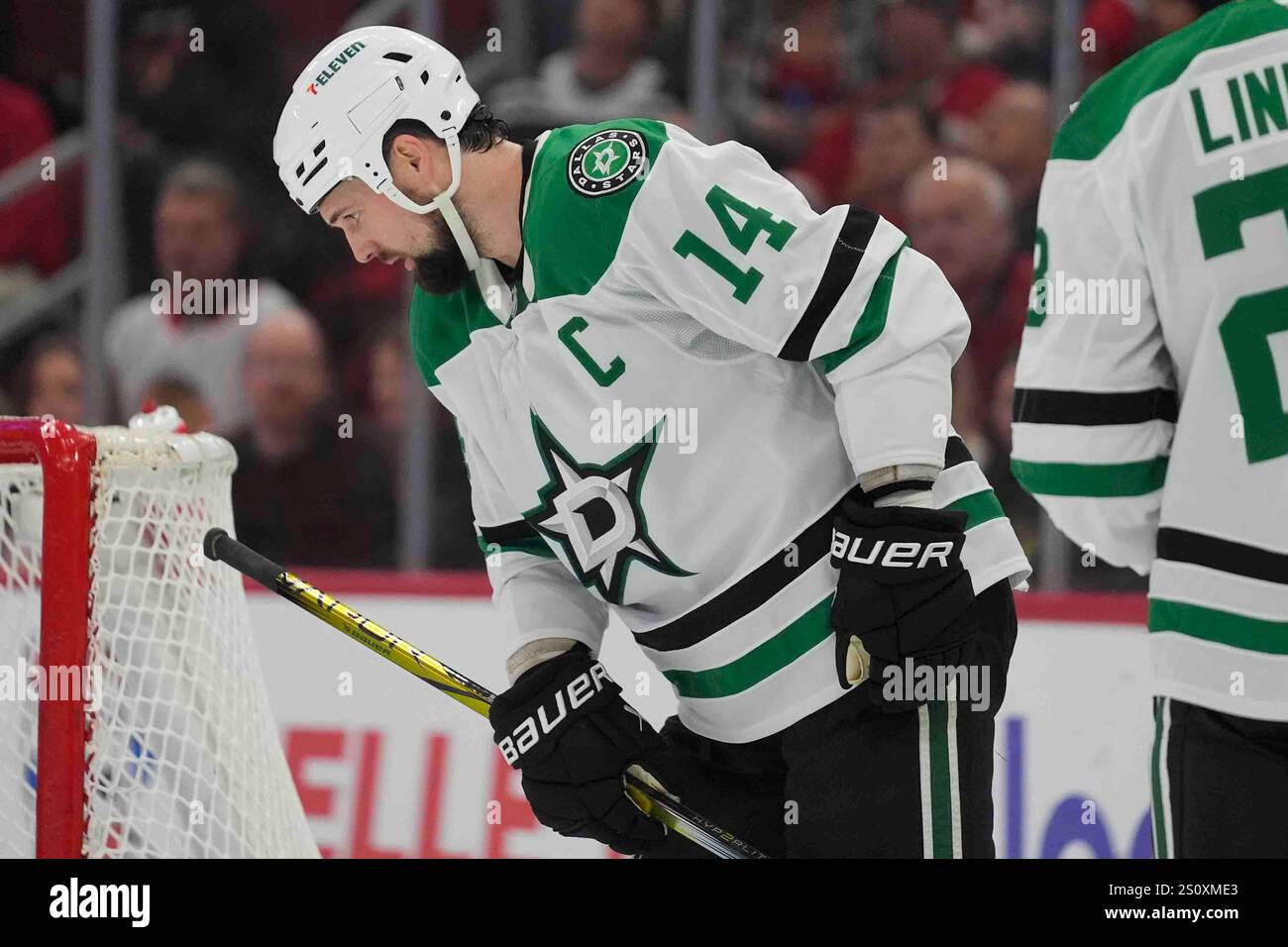 Dallas Stars left wing Jamie Benn skates to the bench after scoring on ...