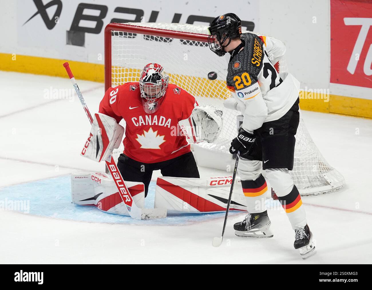 Ottawa, Canada. 29th Dec, 2024. Germany forward Maxim Schafer watches ...