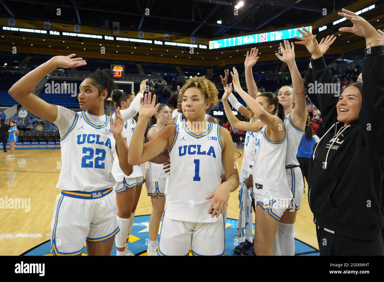 UCLA Bruins guard Kiki Rice (1) and forward Kendall Dudley (22) wave to ...